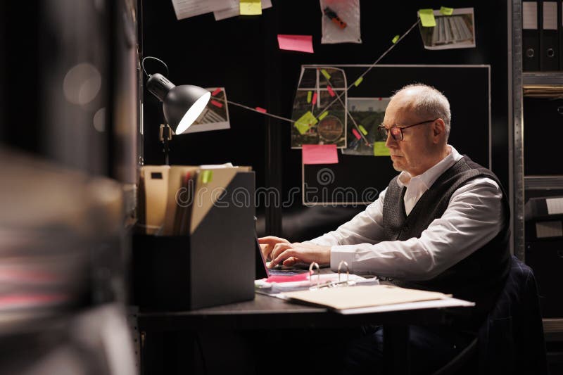 Elderly Man Inspector Sitting at Desk Table in Evidence Room Stock ...