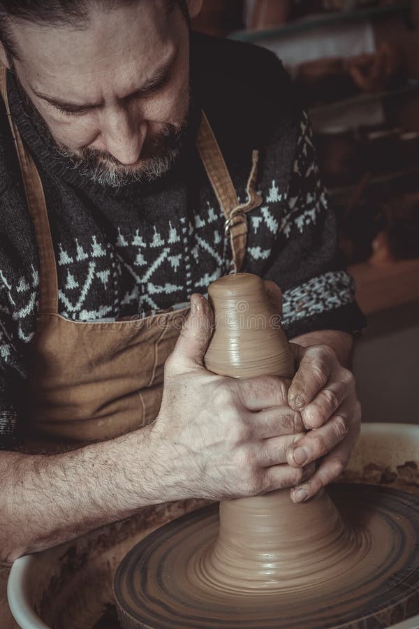Elderly Man Making Pot Using Pottery Wheel in Studio Stock Image ...