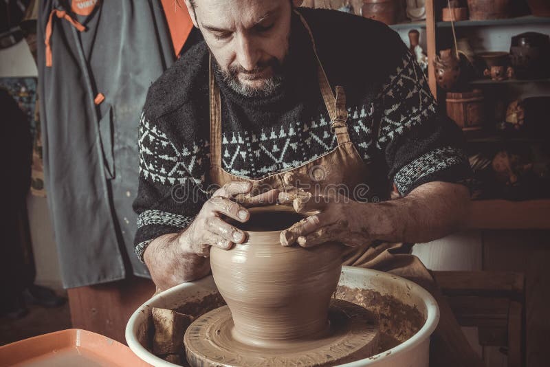 Elderly Man Making Pot Using Pottery Wheel in Studio Stock Image ...