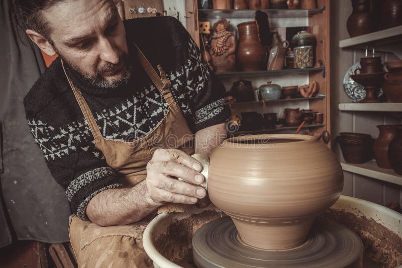 Elderly Man Making Pot Using Pottery Wheel in Studio Stock Image ...