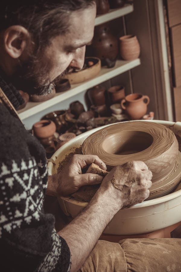 Elderly Man Making Pot Using Pottery Wheel in Studio Stock Image ...