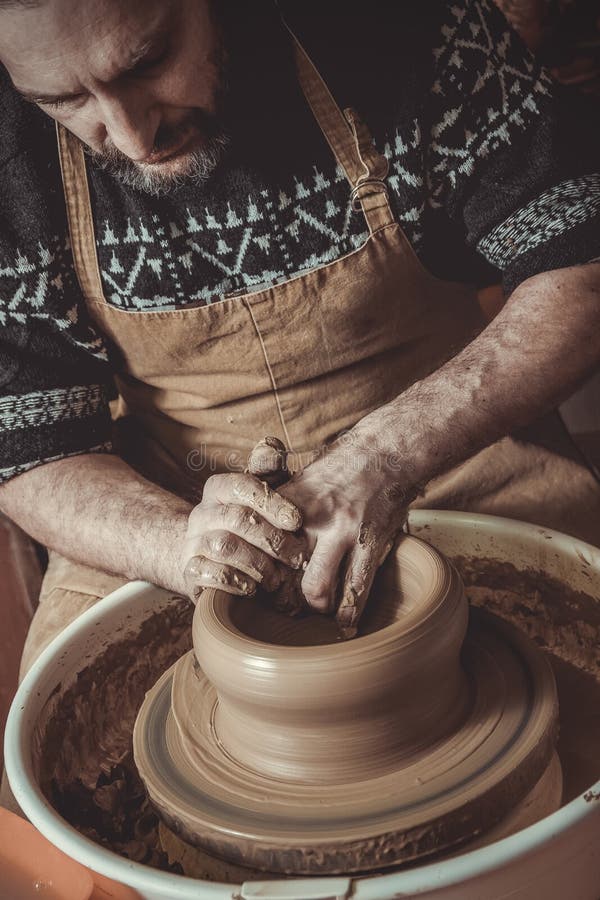 Elderly Man Making Pot Using Pottery Wheel in Studio Stock Image ...