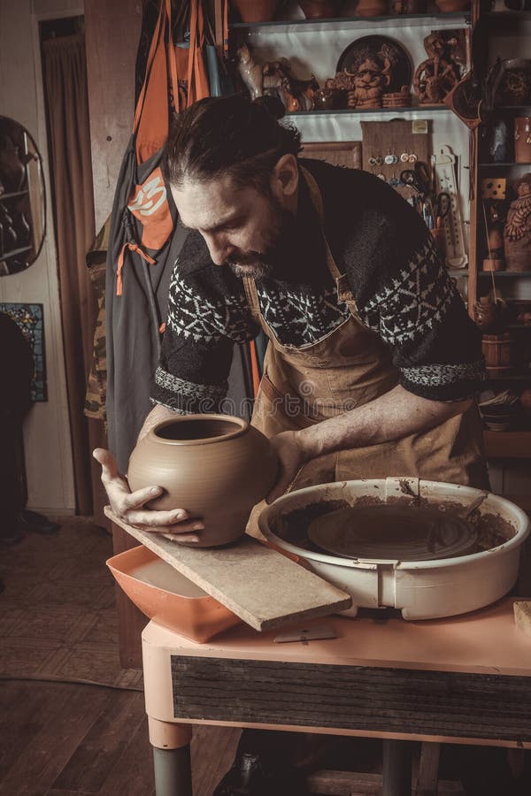 Elderly Man Making Pot Using Pottery Wheel in Studio Stock Image ...
