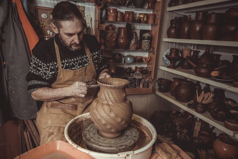 Elderly Man Making Pot Using Pottery Wheel in Studio Stock Image ...