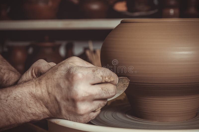 Elderly Man Making Pot Using Pottery Wheel in Studio Stock Photo ...