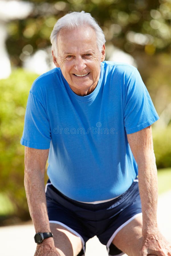 Elderly man out for a run stock image. Image of foreground - 55892887