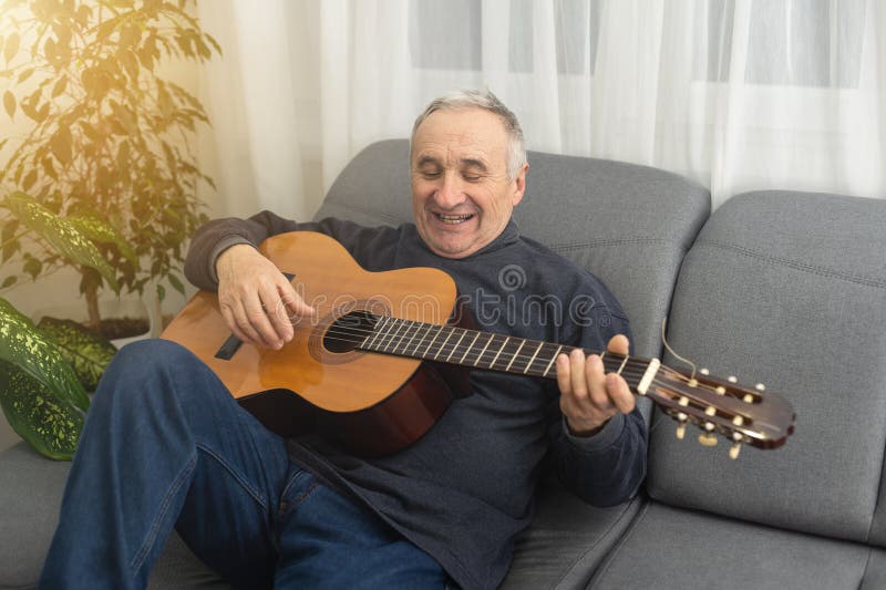 Elderly Man Playing on a Musical Instrument, Accordion Stock Photo ...