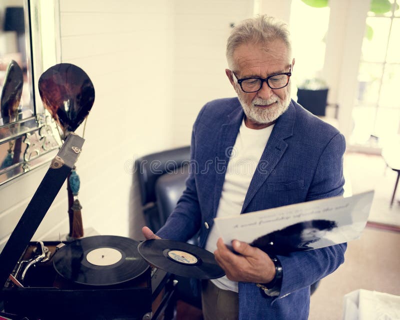 An Elderly Man Playing a Record Stock Photo - Image of vintage ...