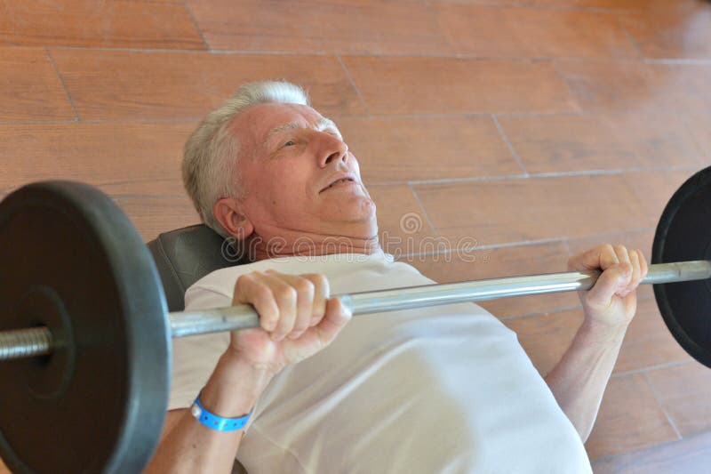 Elderly man playing sports stock image. Image of fitness - 39463303