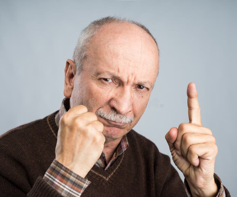 5,205 Pointing Up Serious Face Stock Photos - Free & Royalty-Free Stock ...