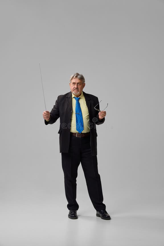 Elderly Man, Professor with Serious Expression Standing with Pointer ...