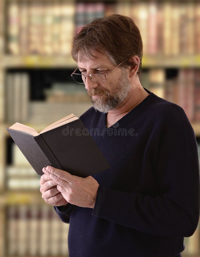 Bald Bearded Man Reading Book Lies on the Floor Stock Photo - Image of ...