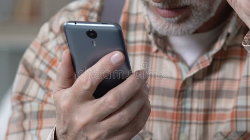 Elderly Man Reading Message in Smartphone, Poor Eyesight, Modern ...