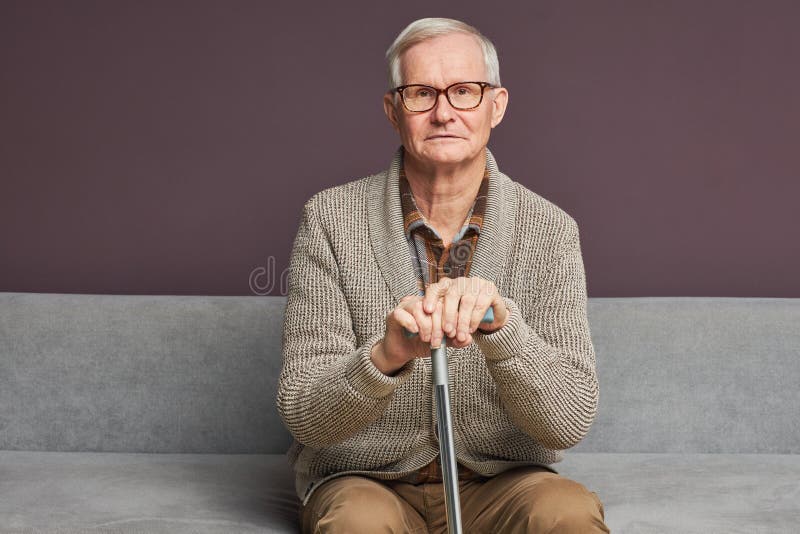 Elderly Man Resting on Sofa Stock Image - Image of rest, modern: 269238031