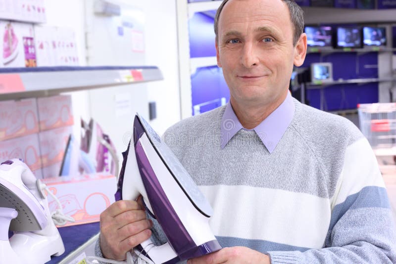 Elderly Man in Shop at Information Screen Stock Image - Image of adult ...