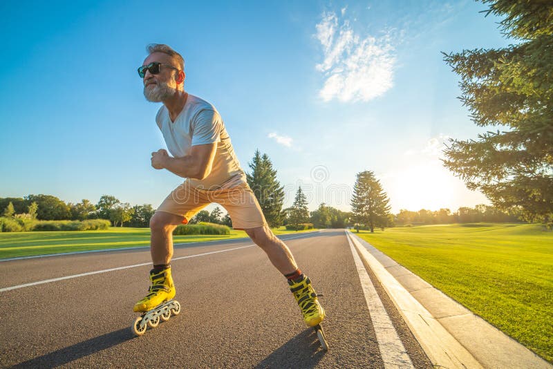The Old Man Rollerblading on the Alley Stock Image - Image of lifestyle ...