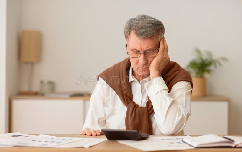 Elderly Man Using Calculator Working Sitting at Workplace in Office ...