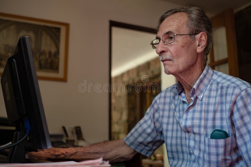 Elderly Man Using Laptop Computer. Older Man with Technology. Stock ... Elderly Man Using Laptop Computer. Older Man with Technology. Stock ...