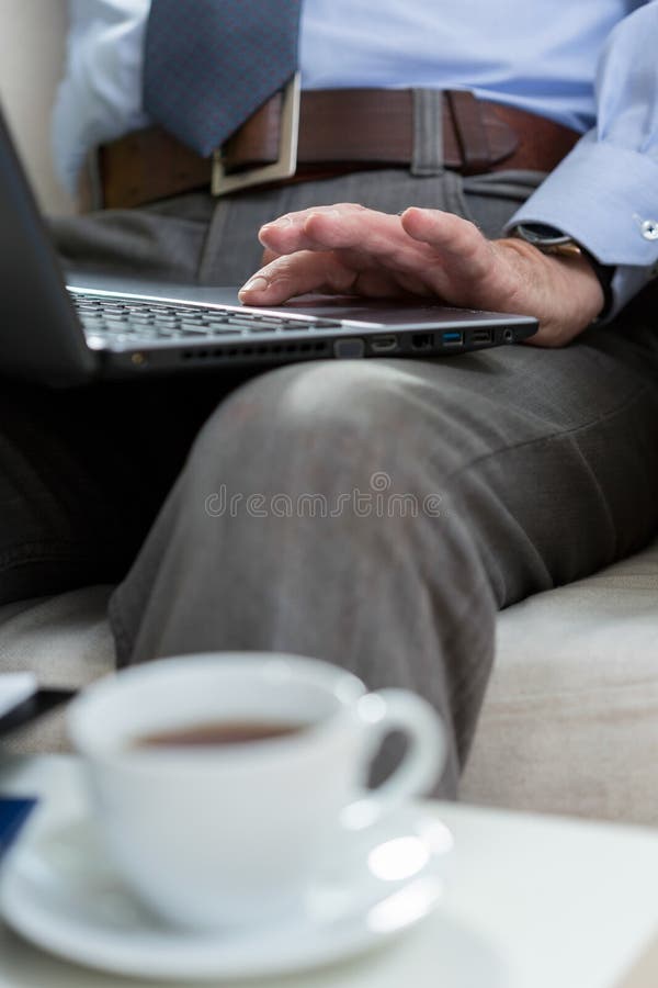 Elderly man using laptop stock image. Image of pensioner - 54094493