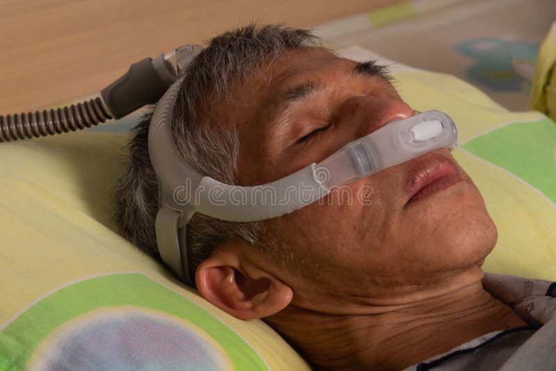 Elderly Man Using Medical CPAP Machine Stock Photo - Image of machine ...