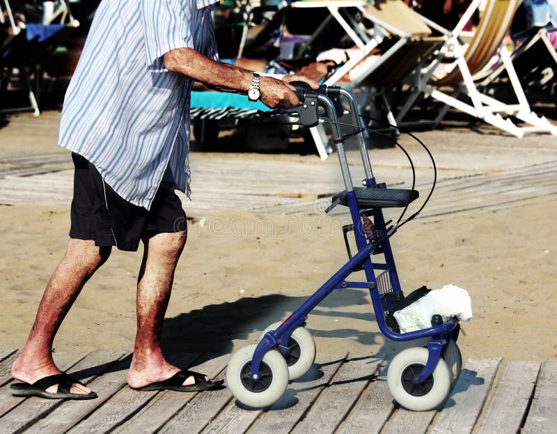 Elderly Man Walking with Walker on the Beach Stock Image - Image of ...