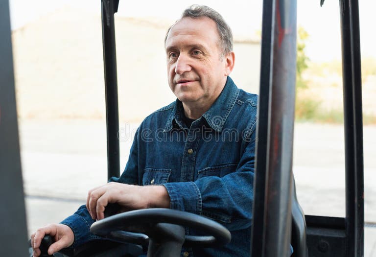 Elderly Man of Winery Goes on Loader Stock Image - Image of warehouse ...