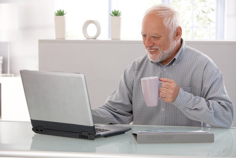 Elderly Man Working On Laptop Smiling Stock Image - Image of european ... Elderly Man Working On Laptop Smiling Stock Image - Image of european ...