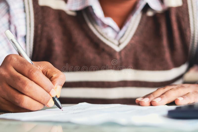 Elderly Man Writing on the Paper Using a Pen Stock Photo - Image of ...