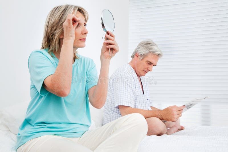 Elderly Married Couple in Bedroom Stock Photo - Image of elderly ...