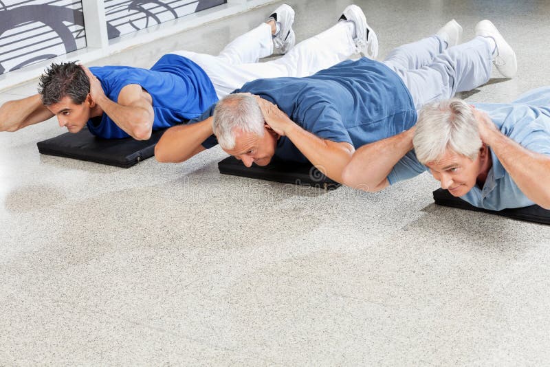Elderly Men Doing Back Exercises Stock Image - Image of people, back ...