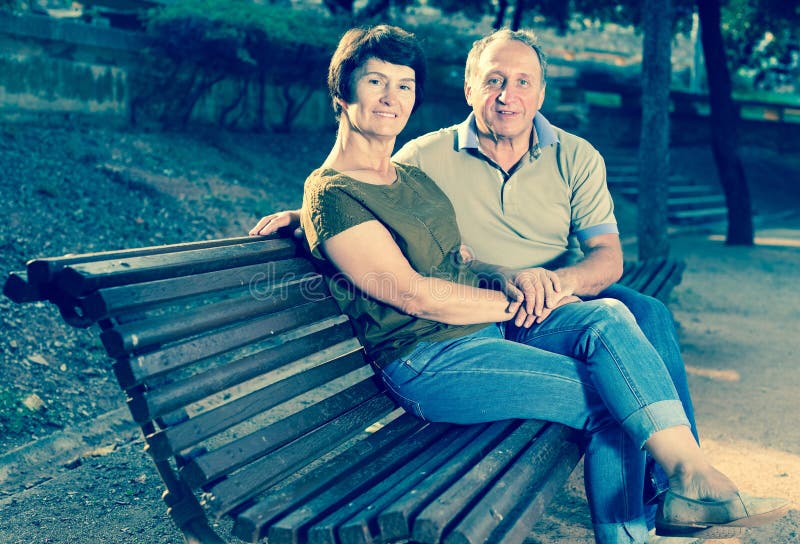 Elderly Man and Woman Embracing on Bench Stock Photo - Image of hands ... Elderly Man and Woman Embracing on Bench Stock Photo - Image of hands ...