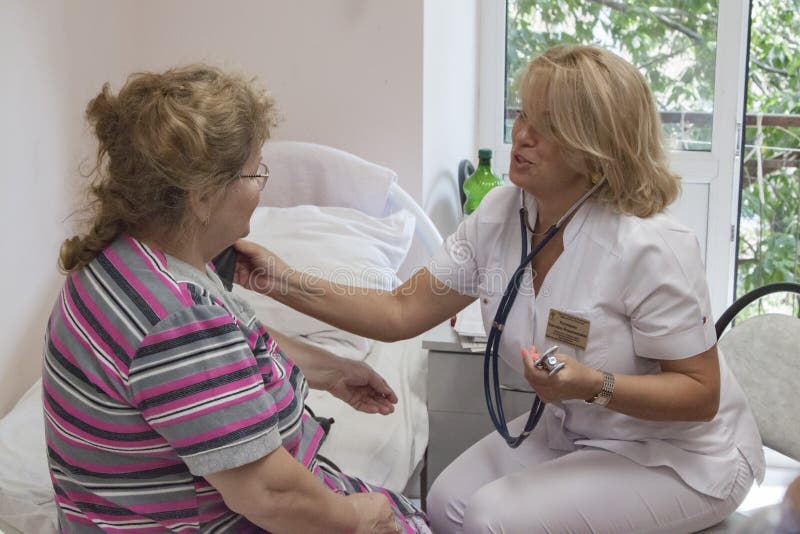 Elderly Patient at a Nurse in a Geriatric Clinic Editorial Photo ...