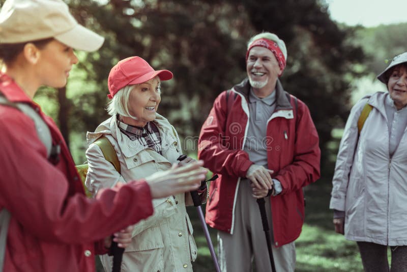 Elderly People Feeling Inspired by Hiking in Mountains Stock Photo ...