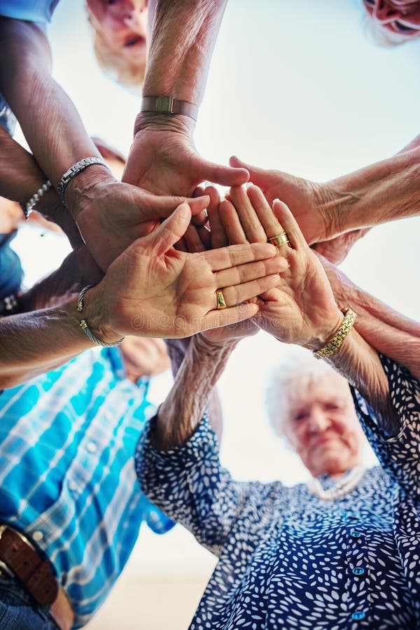 Elderly People, Friends and Hands Stack Outdoor in Low Angle for ...