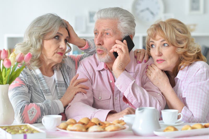 Elderly People Having Breakfast and Using Mobile Phone Stock Image ...