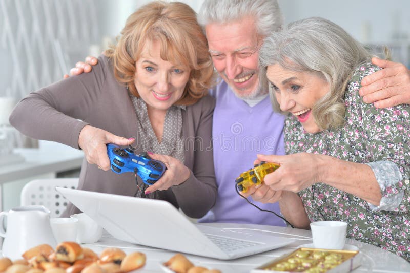Elderly People Playing Computer Game Stock Image - Image of internet ...