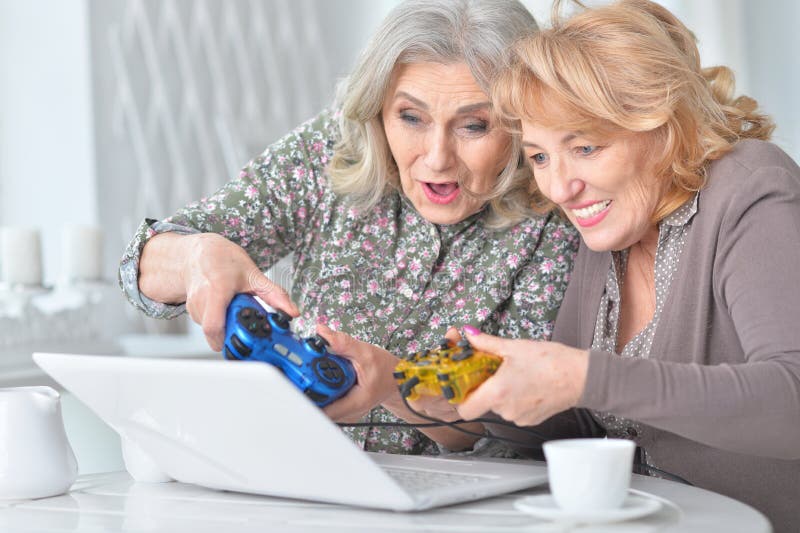 Elderly People Playing Computer Game Stock Photo - Image of together ...