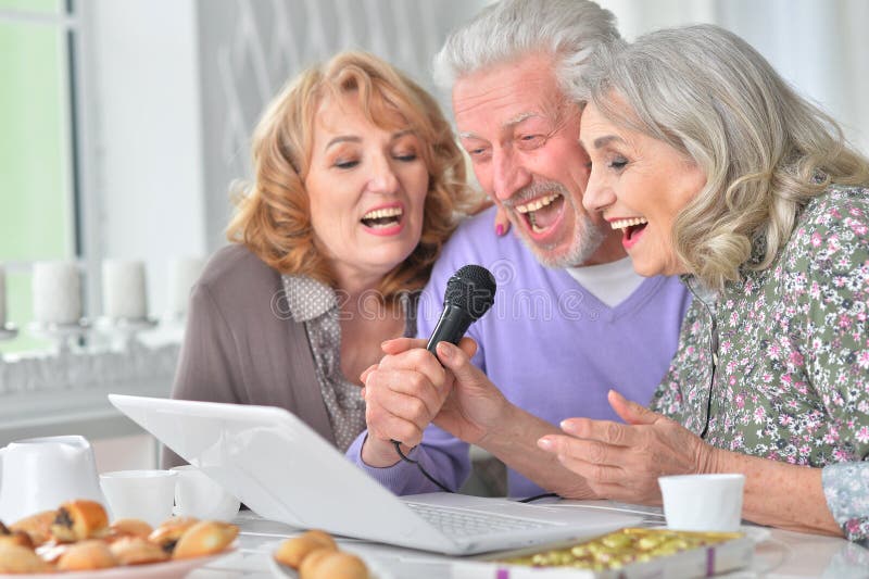 Old People Sing at the Table Stock Image - Image of happy, white: 93679545
