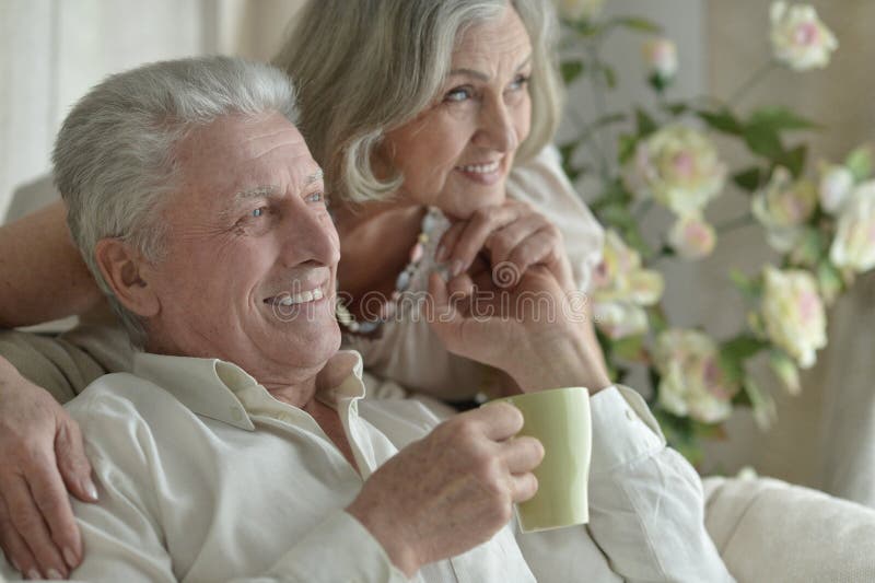Elderly people with tea stock photo. Image of tender - 69346034