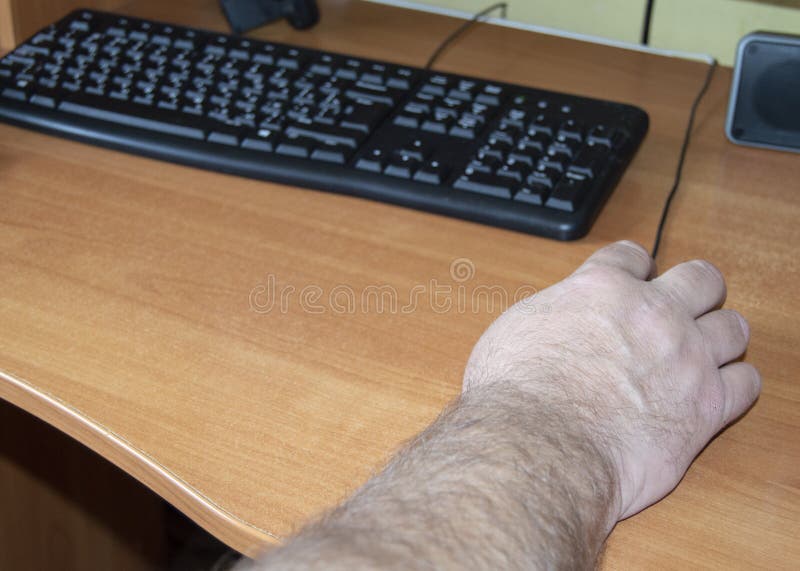 An Elderly Person, a Pensioner, a Disabled Person Using a Computer ...