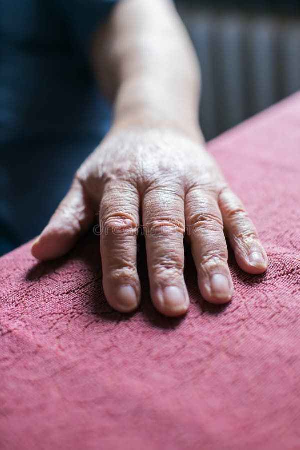 Elderly Person& X27;s Hand Resting on Table Stock Photo - Image of ...