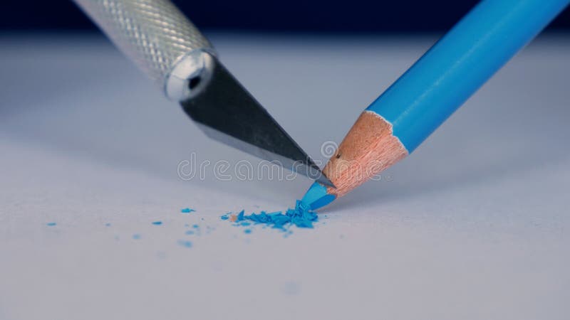 Elderly Person Sharpen a Colored Pencil Using a Sharp Little Knife ...
