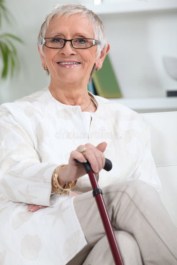 Elderly person smiling stock image. Image of sitting - 27386531