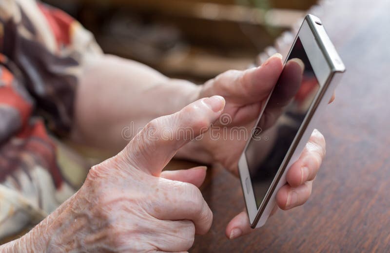 Elderly Person Using Smartphone Stock Photo - Image of elderly, modern ...