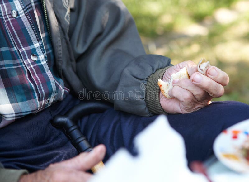 Elderly Poor Man Eating Bread Stock Photo - Image of disease, hunger ...