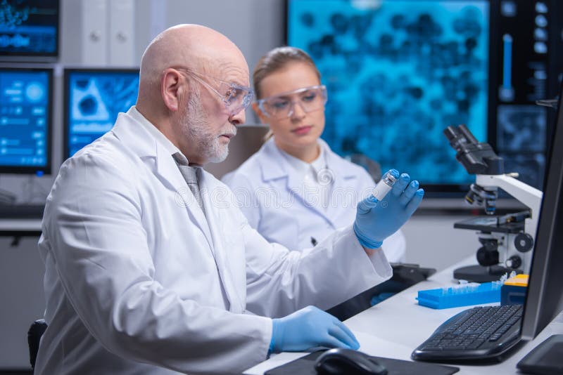 Professor and His Young and Professional Laboratory Assistant are Doing ...