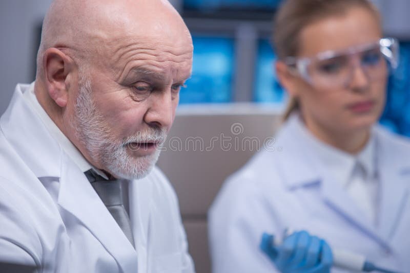 Professor and His Young and Professional Laboratory Assistant are Doing ...