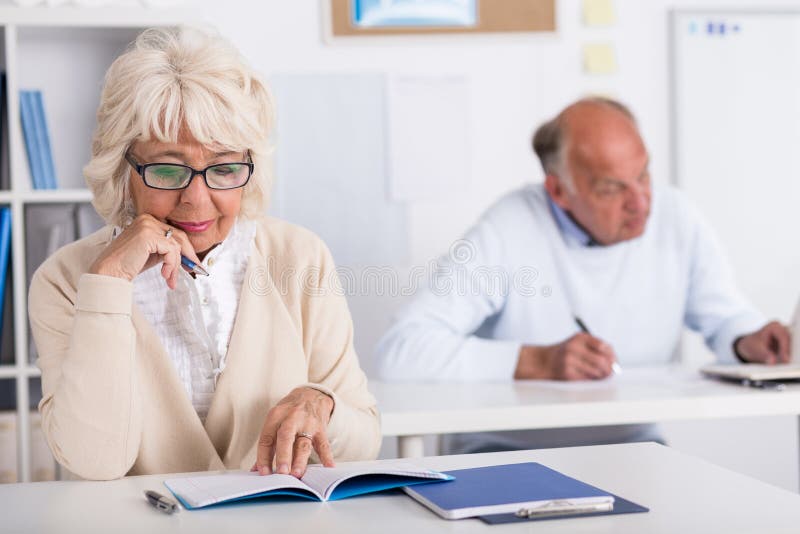 Elderly Students Working in Class Stock Image - Image of caucasian ...