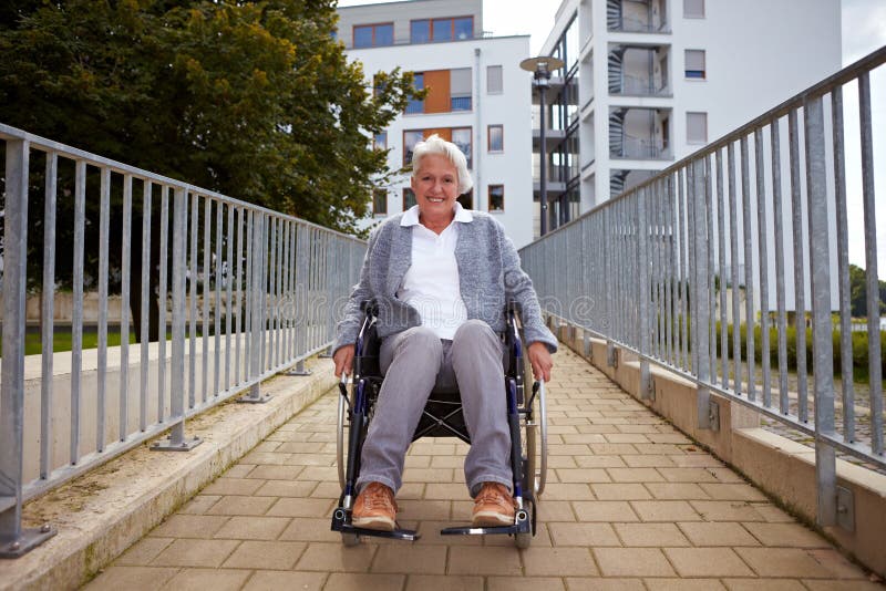 Elderly Wheelchair User on Ramp Stock Image - Image of disabled ...