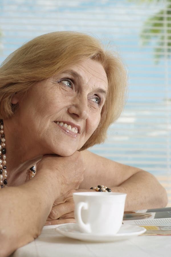 Elderly Woman Drinking Coffee Stock Image - Image of dress, drink: 42947421
